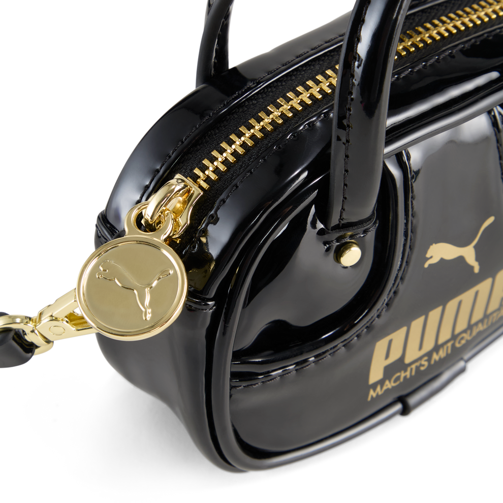 PUMA 1976 POCKET GRIP BAG - PUMA BLACK-ARCHIVE GOLD – ABC-MART Việt Nam